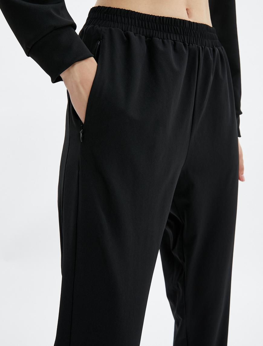 Siyah Kadın Basic Jogger Dokuma Eşofman Altı Fermuarlı Cepli 4WAK40016NW | Koton